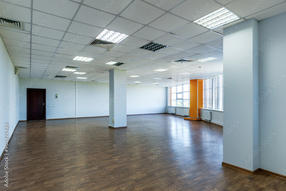 panorama view in empty modern office hall with sunlight in windows ...