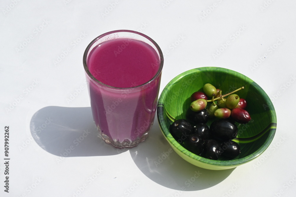 Syzygium cumini fruits juice. Its other names Malabar plum, Java plum ...