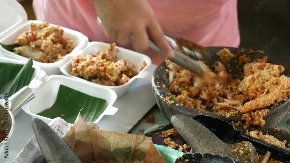 Making ayam geprek - Indonesian street food. popular fusion dish of ...