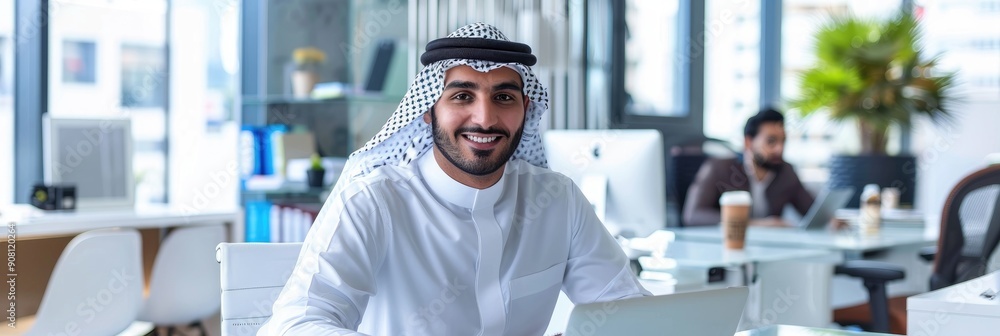 Young Middle Eastern Businessman Smiling at Worktable in Modern Office ...