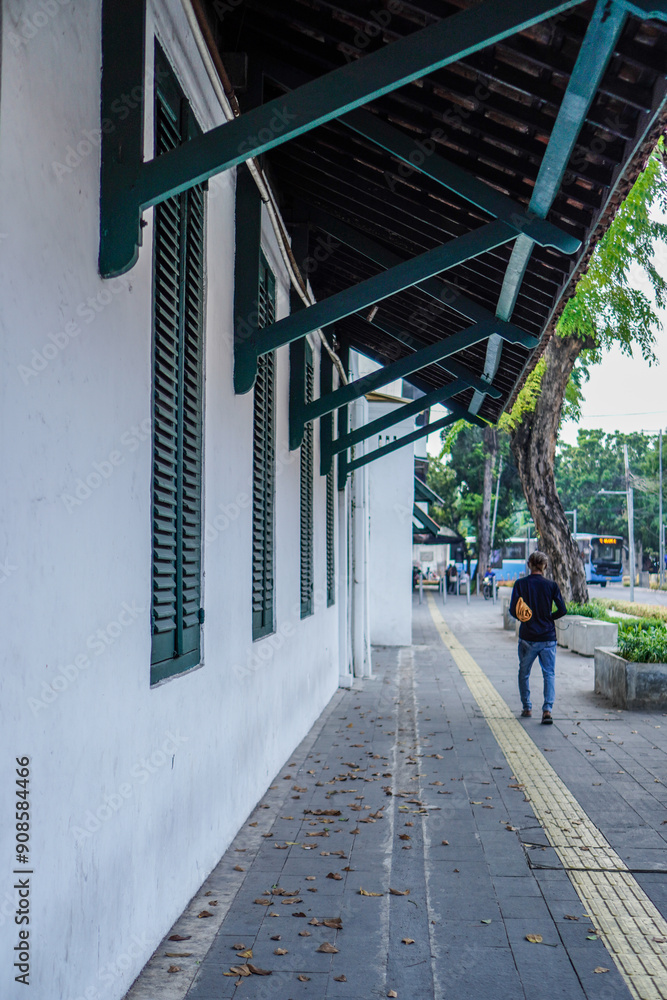 side view from a window of a classic old building on the outskirts of a ...