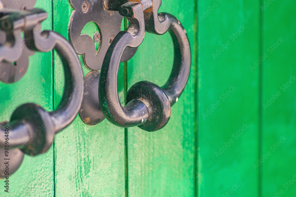 Iron forged handle bell on door with protruding part for easy hand grip ...