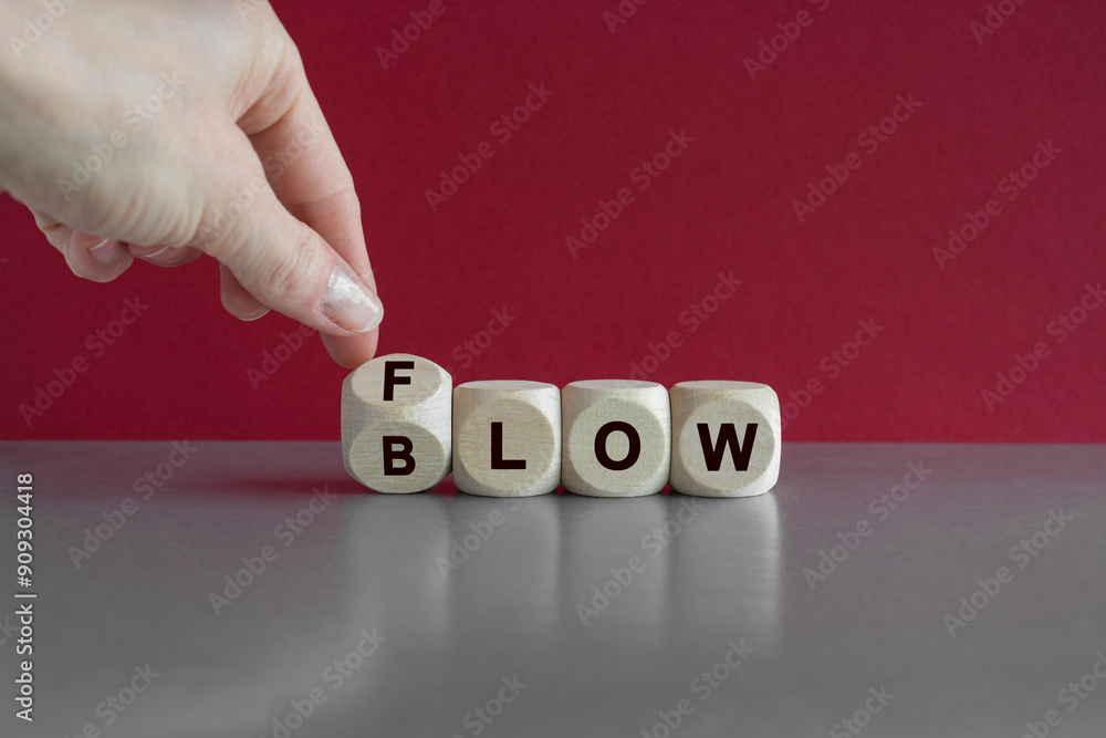 Blow or flow symbol. Male turned a cube and changes the word blow to ...