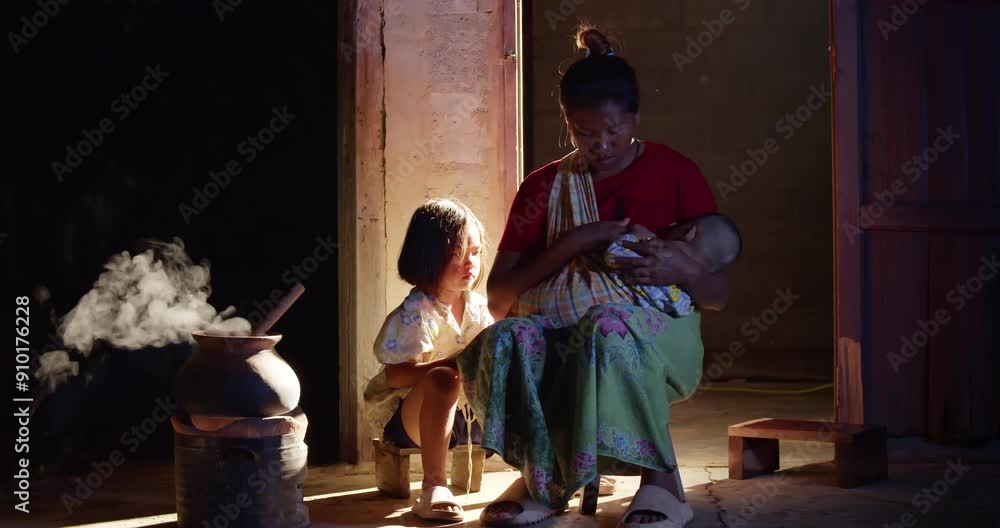 An Asian woman who is a farm laborer in Thailand, live in an old worker ...