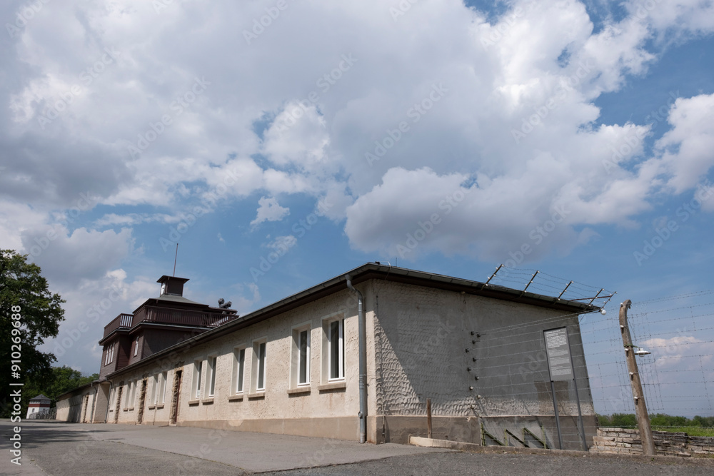 Buchenwald concentration camp entrance gatehouse with barbed wire fence ...