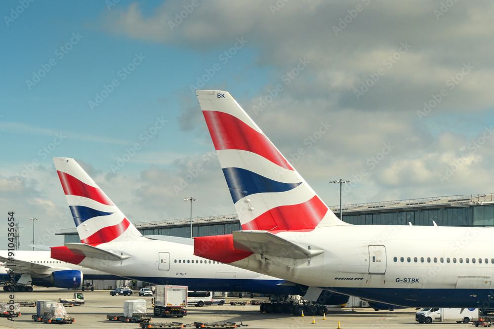 London, England, UK - 29 April 2024: Tail fins of Boeing 777 passenger ...