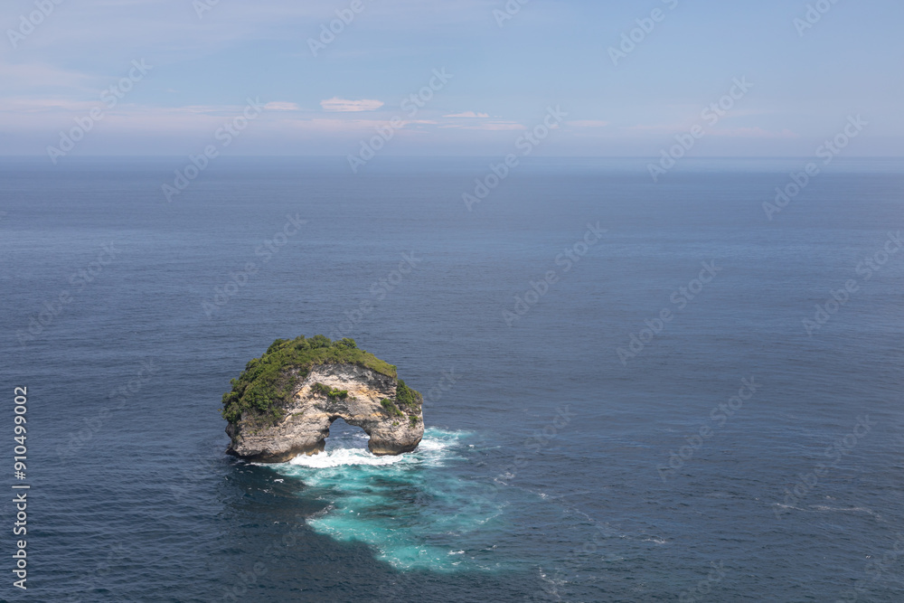 Row of empty deck chairs in cloudy weather on the Atuh beach on the ...