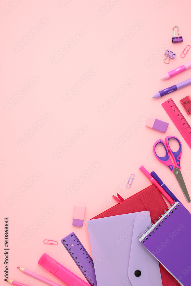 Bright school supplies on a pink background, including pencils, paper ...