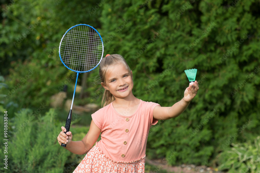 joyful little girls playing badminton, having fun in the park on sunny ...