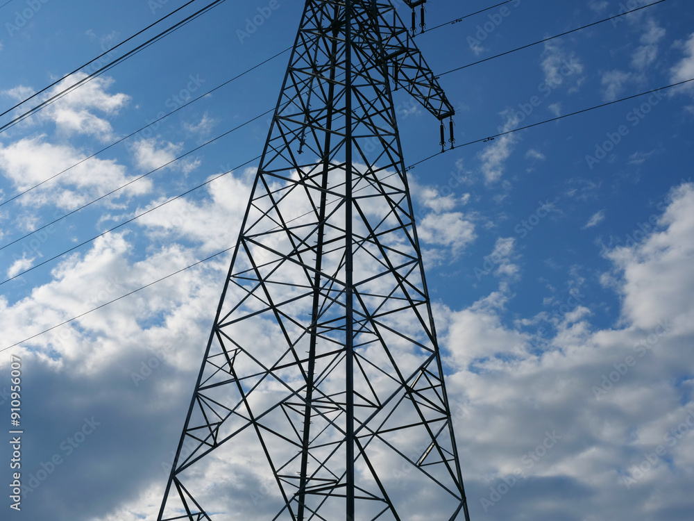 Electric tower and wires at sunset showcase the evolution of energy ...