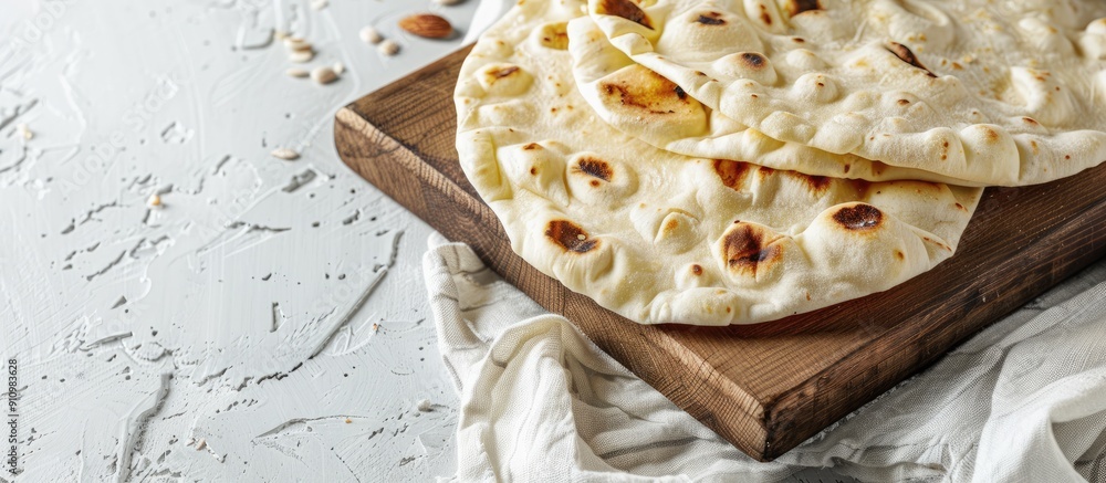 Lavash an Armenian flatbread displayed with pita bread on a wooden ...