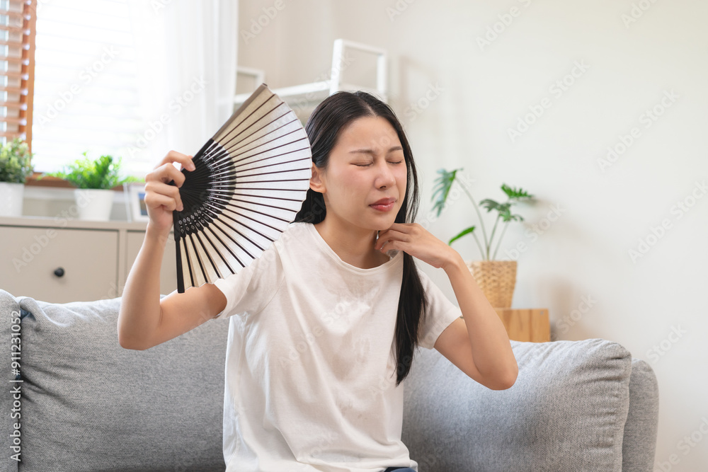 Suffering summer heat wave stroke, hot weather, tired asian young woman ...