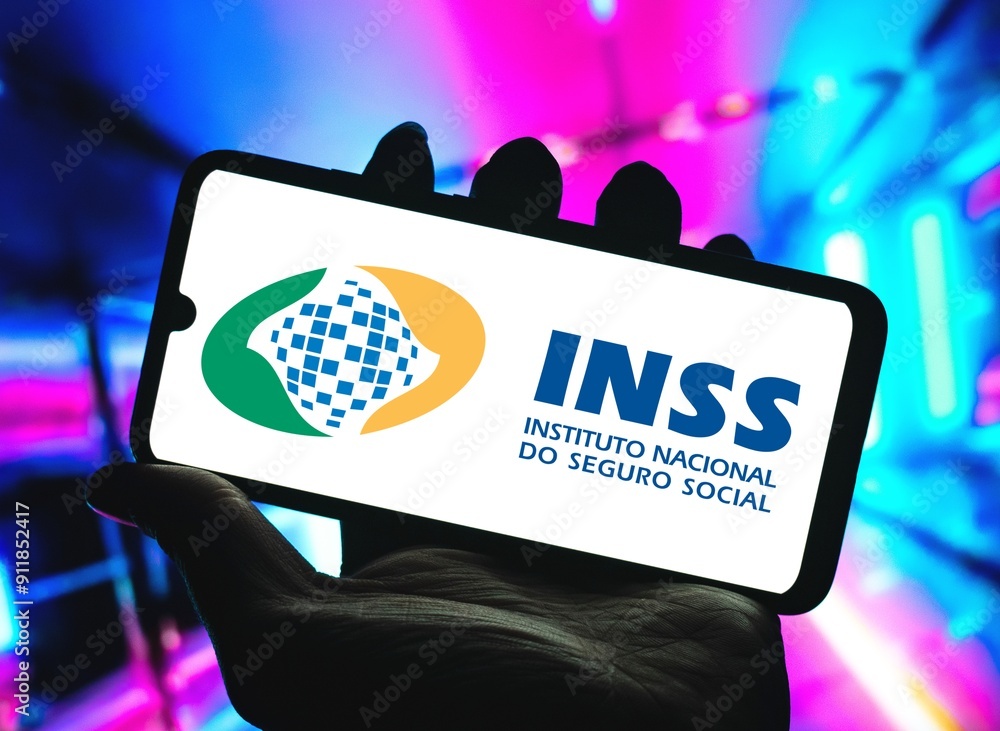 Photographic illustration of the INSS logo is displayed on the screen ...