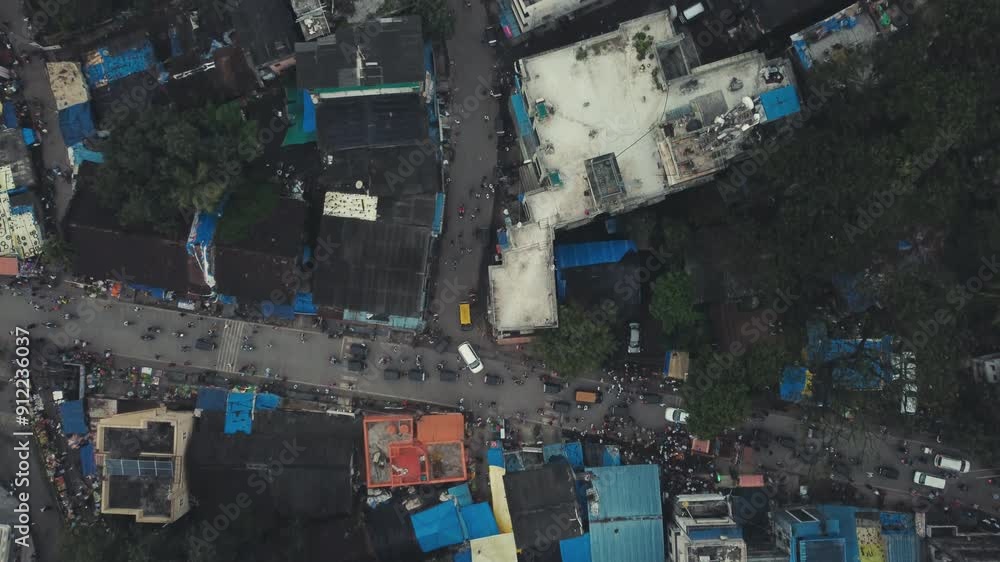 Bustling traffic and crowded streets in rural mumbai during daytime ...