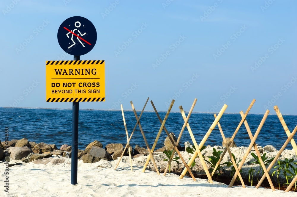 Poster The image shows a sign and sign indicating a safe boundary that ...
