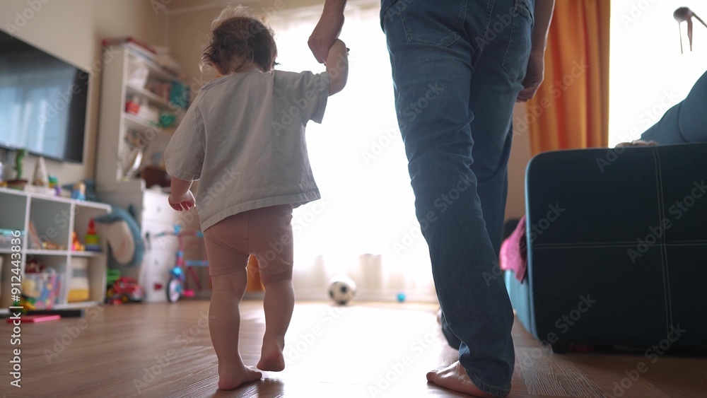 baby first steps with dad. happy family a kid dream concept. dad and ...