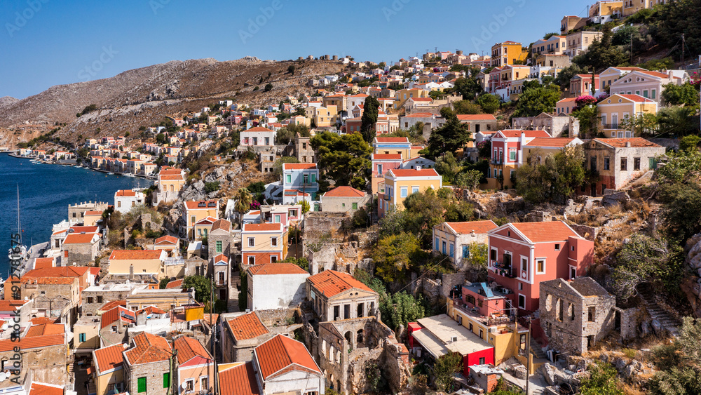 Aerial view of the beautiful greek island of Symi (Simi) with colourful ...