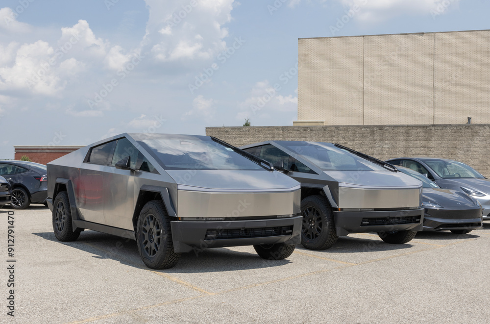 Tesla Cybertruck display at a dealership. Tesla offers the Cybertruck ...