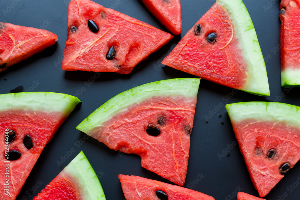 Man is putting pieces of watermelon on . slice food melon concept. a ...