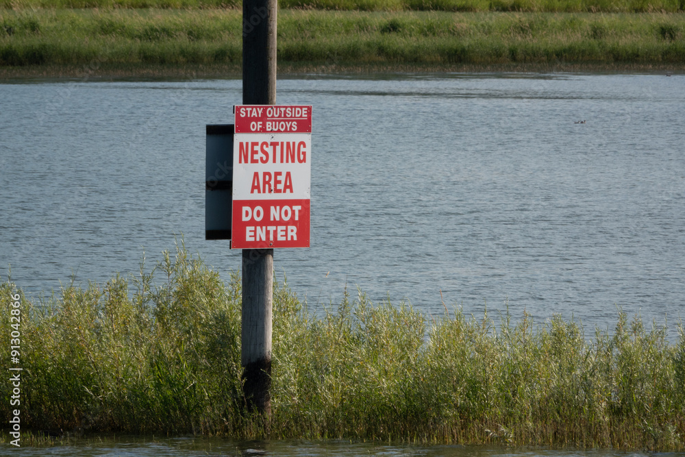 Nesting area sign for conservation of birds nests and chicks with ...