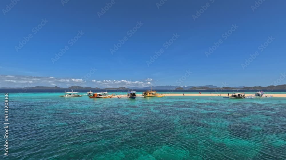 Point of view from a tour boat arriving on a tropical islands with ...