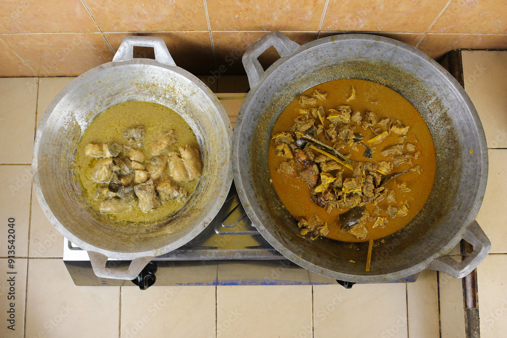 top view of Opor Ayam and Rendang (Indonesian chicken and beef curry ...