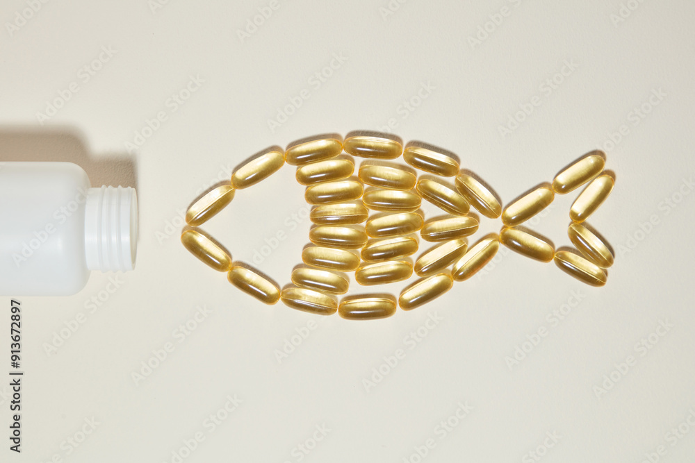 Mock up to advertise supplement pills with plenty yellow fish oil ...