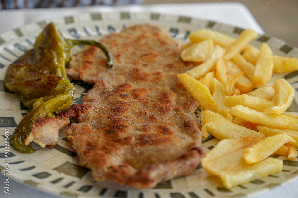Traditional deep fried Wiener schnitzel from veal topside with fried ...