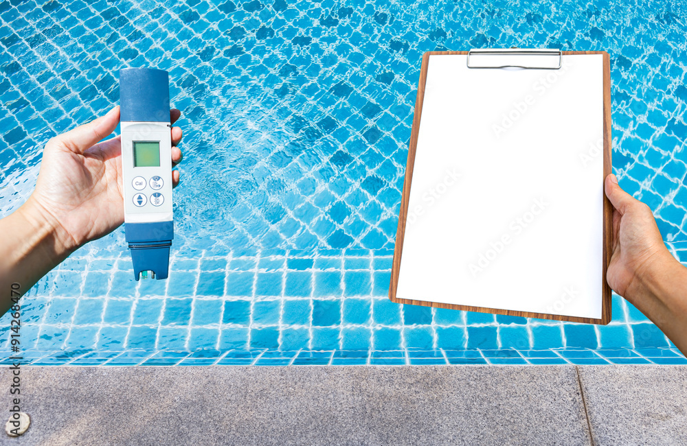Swimming pool water tester with blank report on wooden clipboard over ...