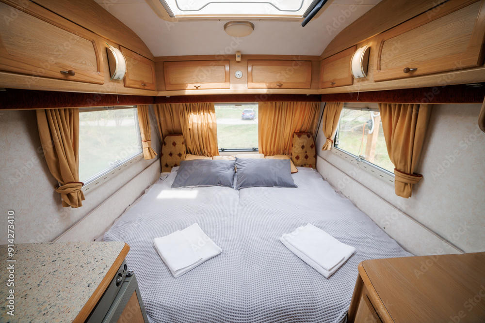 Cozy Caravan Interior with Kitchen and Sleeping Area. Ideal for ...