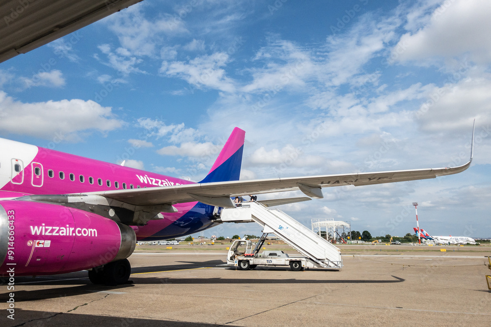 BELGRADE, SERBIA - JUNE 5, 2024: Airbus A320 from Low Cost Carrier Wizzair being prepared for ...