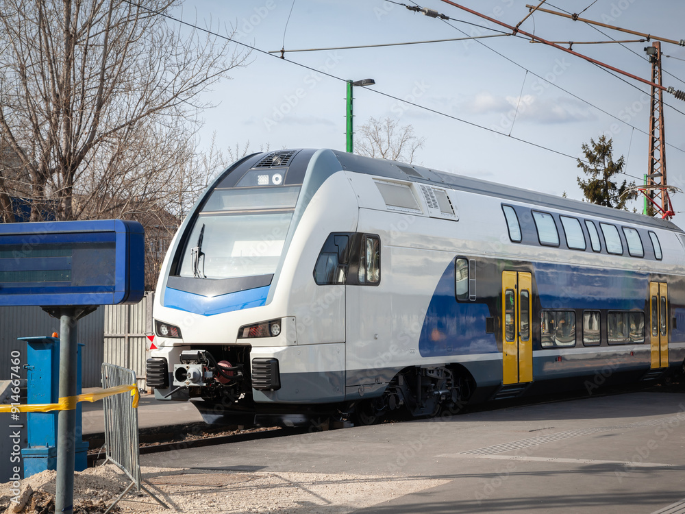 A modern double-decker electric multiple unit (EMU) train designed for ...