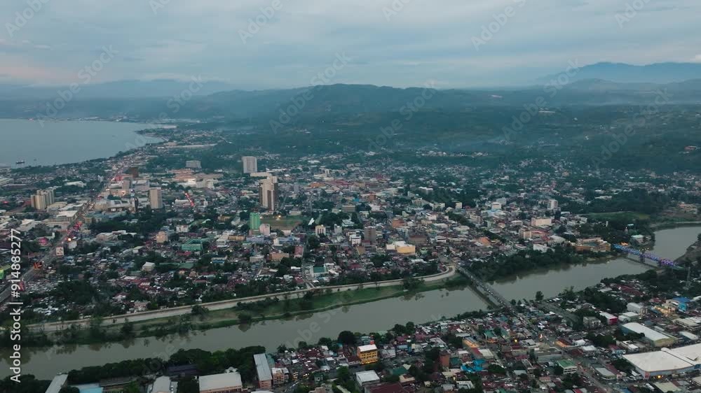 Top view of villages in riverside and highway in Cagayan de Oro ...