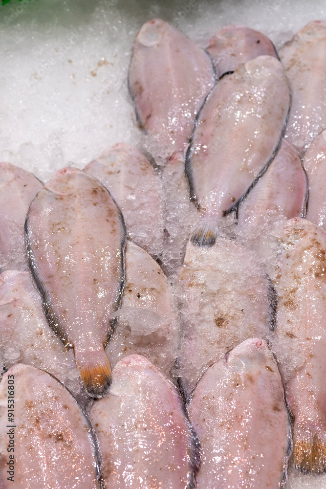 Sole on the counter of a traditional fishmonger in a food market. Stock ...