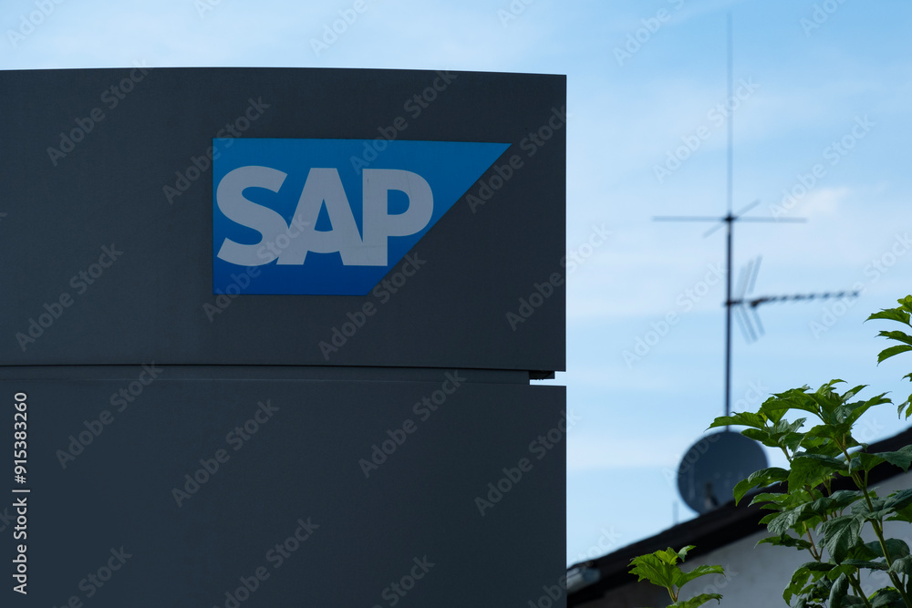 SAP SE logo prominently displayed on modern corporate facade, SAP corporate campus, symbolizing ...