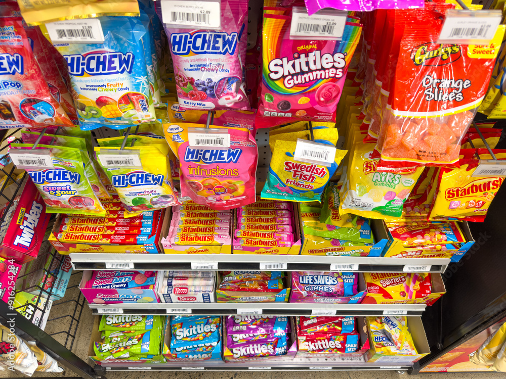 Variety of chewy candies on display inside a Kwik Mart. Stock Photo ...