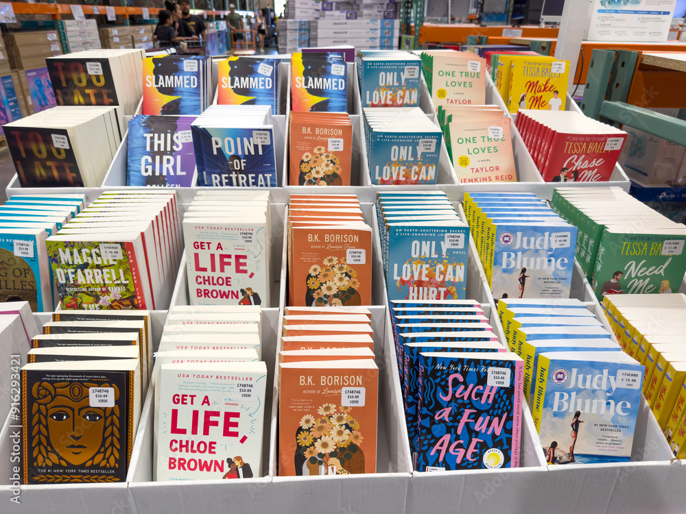 Book display case full of various novels inside a Costco warehouse ...