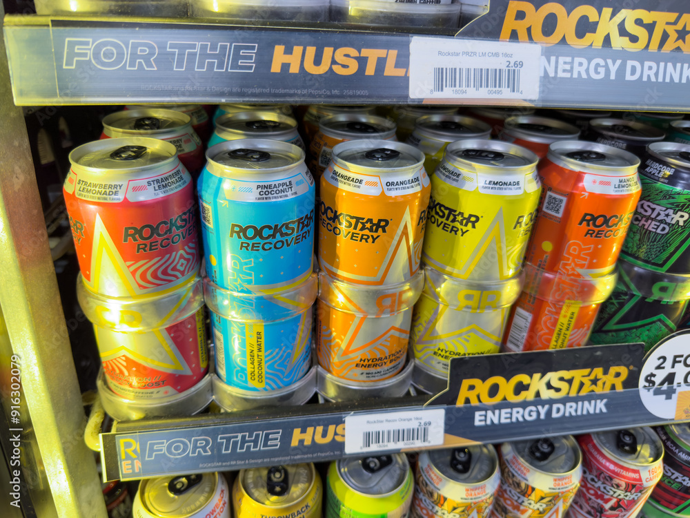 16 oz cans of Rockstar brand energy drinks inside a convenience store ...