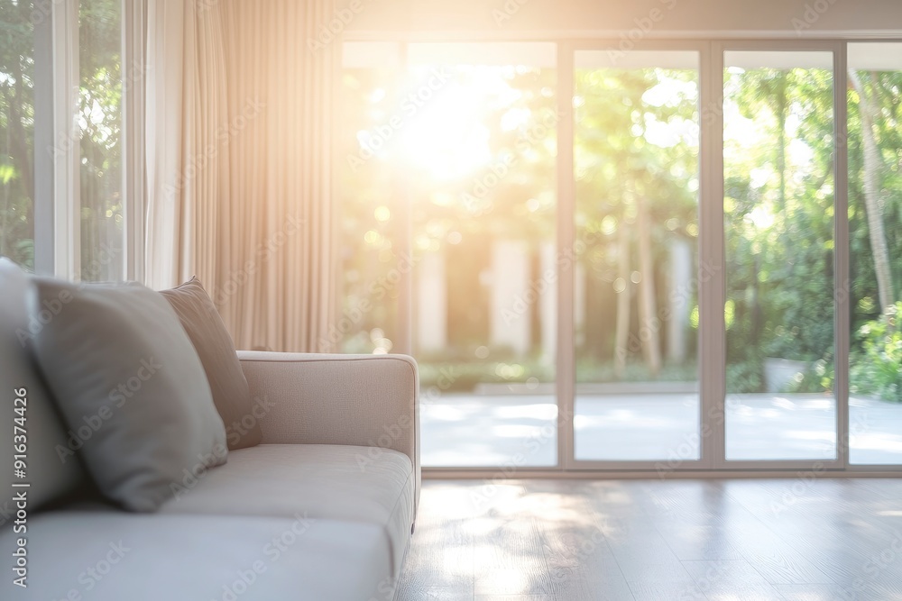 Blur living room at home with morning sunlight at big window for ...
