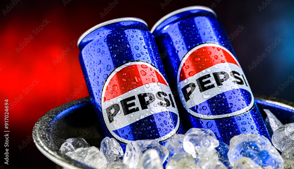 Cans of Pepsi, soft drink produced and manufactured by PepsiCo Stock ...