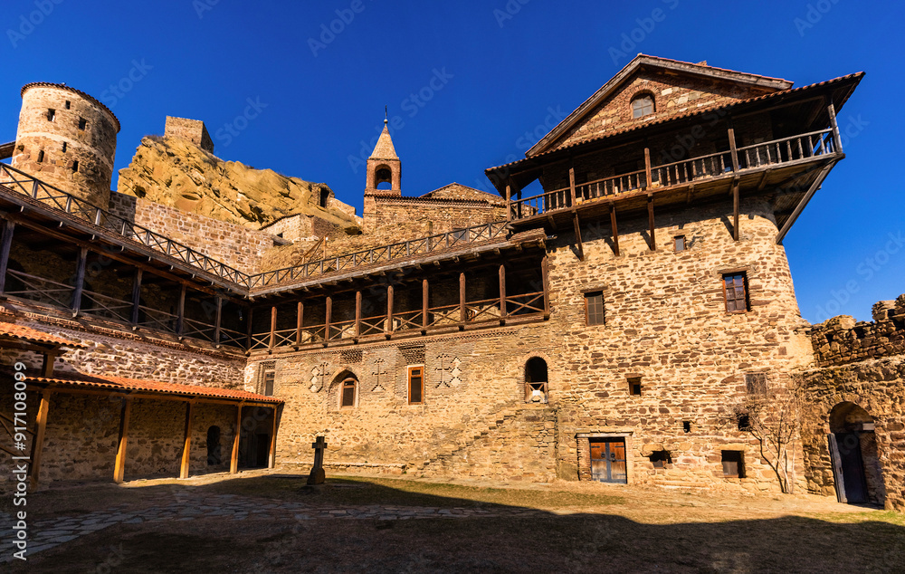 Historic David-Gareji monastery with rich architecture under a clear ...