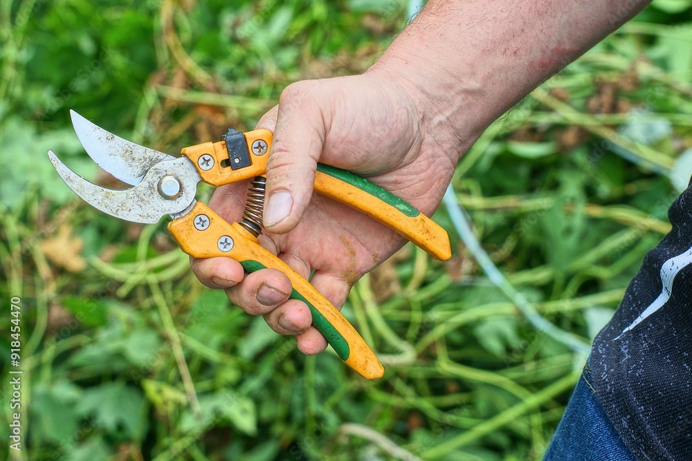one iron industrial shiny sharp with plastic yellow handle modern ...