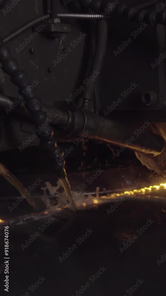 Welder complete with personal protective equipment is perform pipe ...