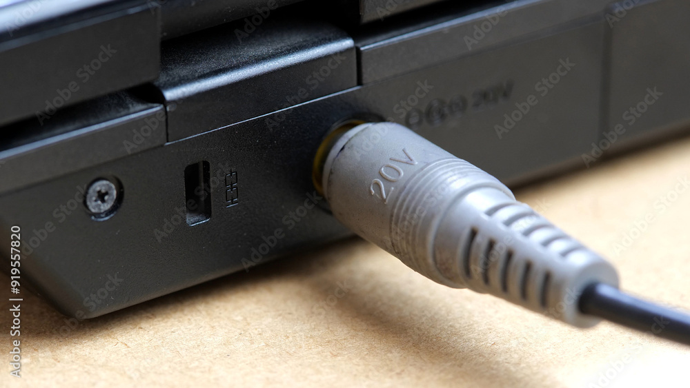 20 volts power adapter power supply cable inside the round laptop ...