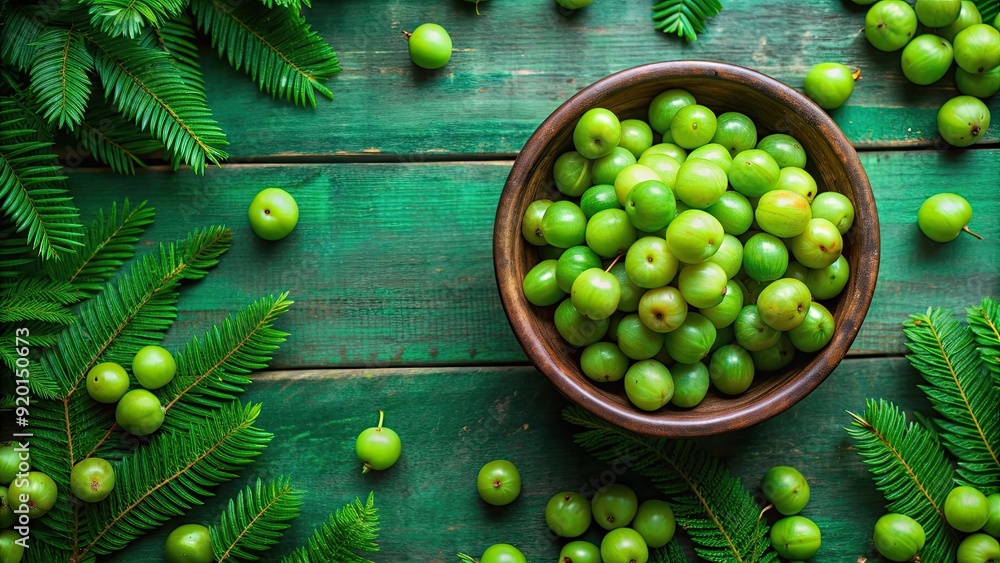 Fresh amla berries arranged in a top view, Amla, Indian gooseberry ...
