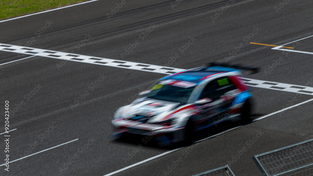 Motion blur race car racing on speed track, Car race on the ...