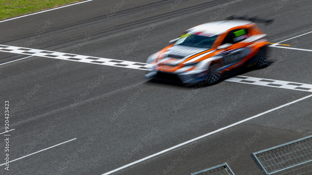 Motion blur race car racing on speed track, Car race on the ...