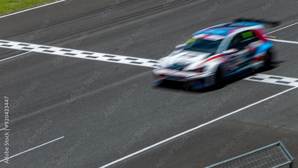 Motion blur race car racing on speed track, Car race on the ...