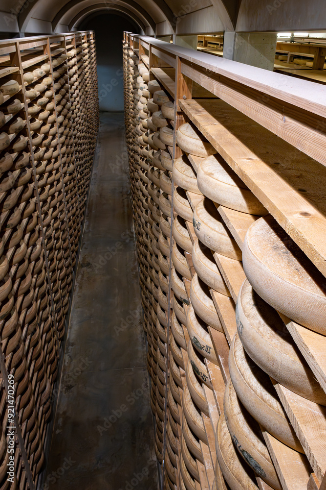 Aging rooms with shelves in cheese caves, central location for aging of ...