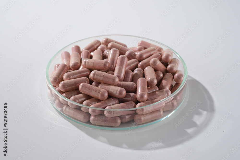 Brick-colored capsules used as a sample for weight loss drugs are ...